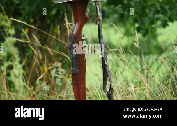 Memorial battlefield cross. Symbol of a fallen US soldier. M1 rifle ...