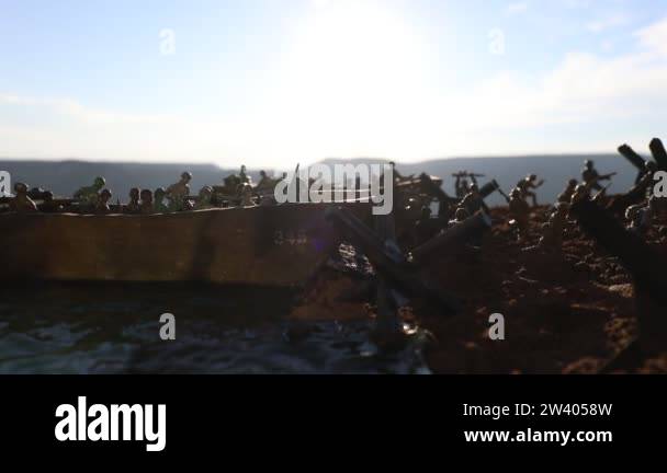World War 2 reenactment (D-day). Creative decoration with toy soldiers ...