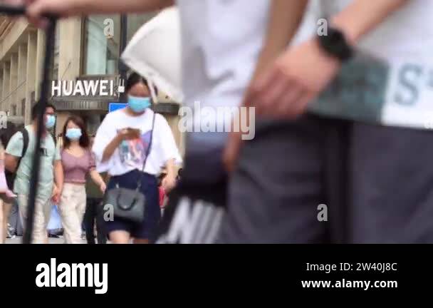 Shanghai, China: August 30, 2020: People are walking in front of Huawei ...