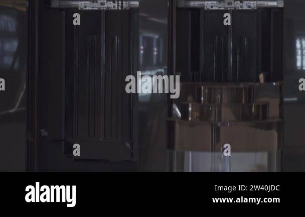 People ride in a new external outside open semi-cylindrical glass ...