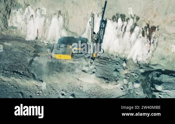 Mining industry concept. Open pit with a boring machine at work Stock ...