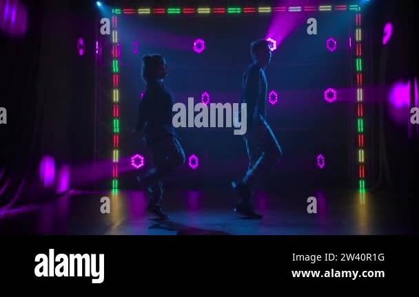 Silhouettes of a talented young girl and boy hip hop dancers. Hip hop ...