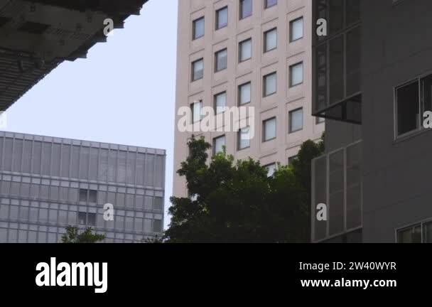The glass windows of the tall buildings in Tokyo Japan Stock Video ...