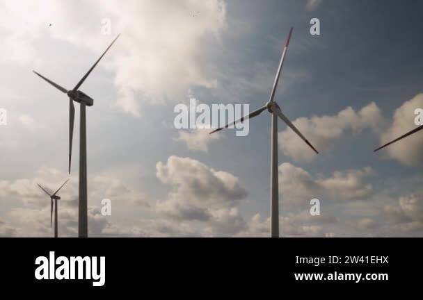 3D Animation of large wind turbines with blades. Wind power plant ...