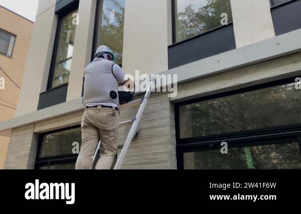 Ladder fan Stock Videos & Footage - HD and 4K Video Clips - Alamy