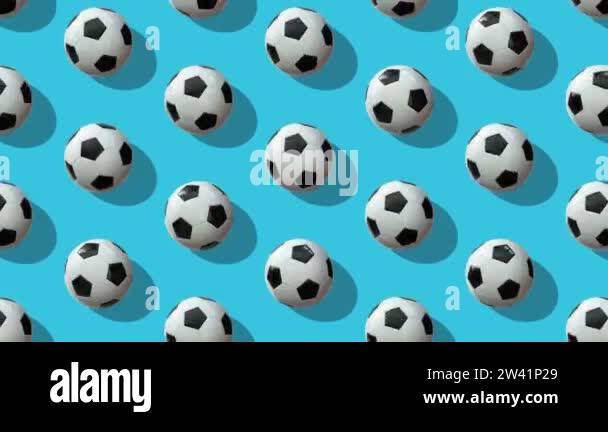 Animated background from large group of soccer balls. Balls roll ...