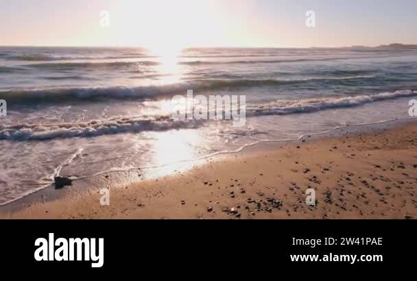 Shoreline of pebbles and sand Stock Videos & Footage - HD and 4K Video ...