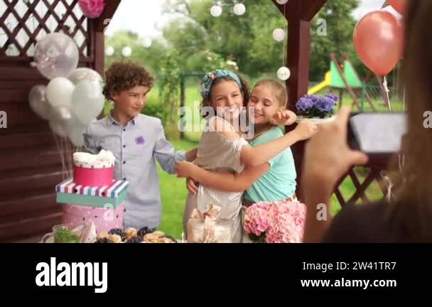 Parents take pictures of their children at a childrens party ...