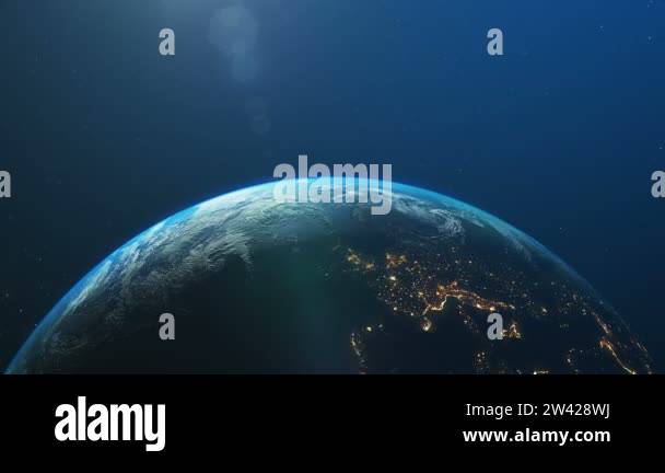 Planet Earth in the rays of the sun, going from night to day with cloud ...