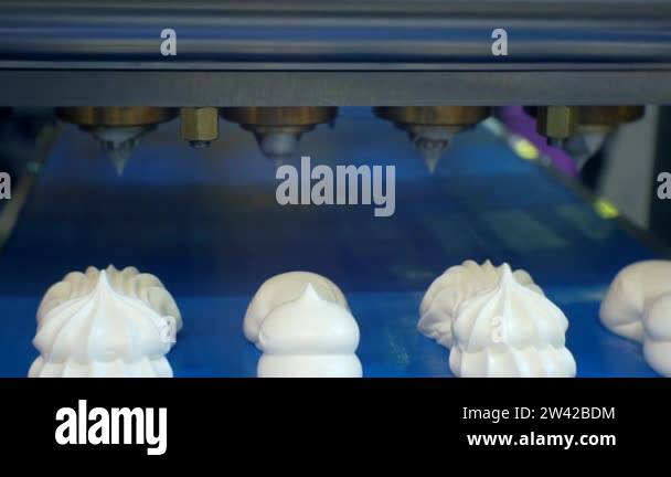 confectionery production. moving background. A special machine makes ...