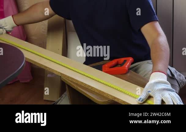 Man measures board tape measure Stock Videos & Footage - HD and 4K ...