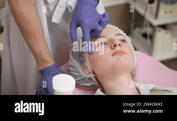 Cosmetology Clinic. Close-up of the face of a young teenage girl with ...