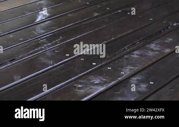 Raindrops on wooden deck Stock Videos & Footage - HD and 4K Video Clips ...