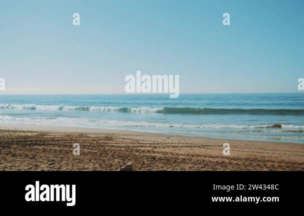 Wet Beach sand drying after waves, view of beautiful seamless never ...