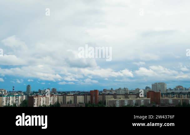 Panoramic view of city background blue sky with floating clouds ...