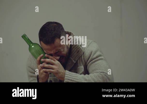 Alcoholism, alcohol addiction and people concept - male alcoholic with ...