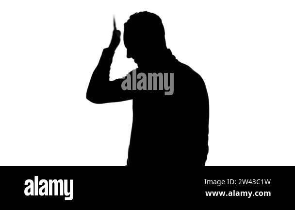 Mans silhouette showing facepalm gesture Stock Video Footage - Alamy