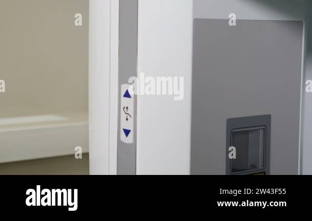 Healthcare concept. Unrecognizable doctor pushing button on mri machine ...