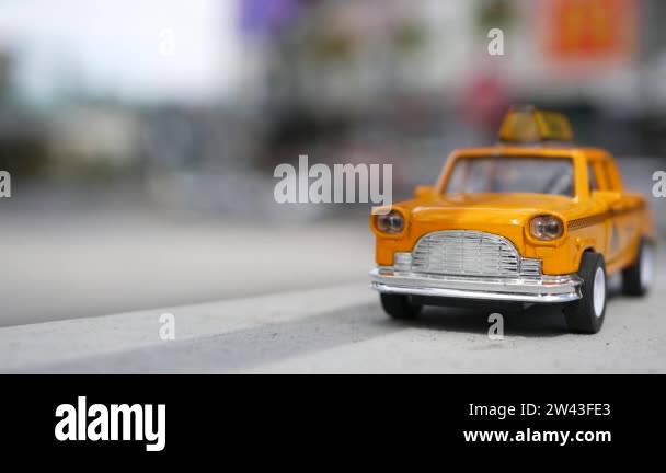 Yellow vacant mini taxi cab close up, Harmon corner, Las Vegas, USA ...