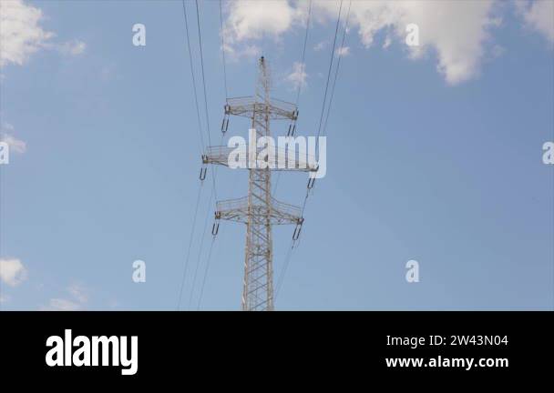 Electricity transportation line. High-voltage tower. Beautiful clouds ...