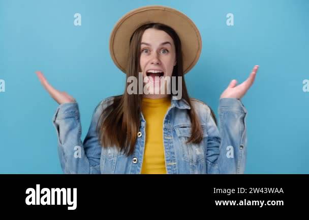 Side view good looking surprised female model looks amazed turn around ...