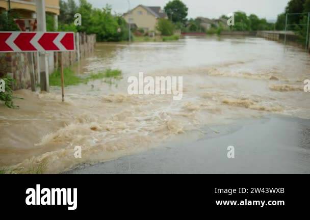 Two male engineers solve the flood problem. Natural disaster major ...