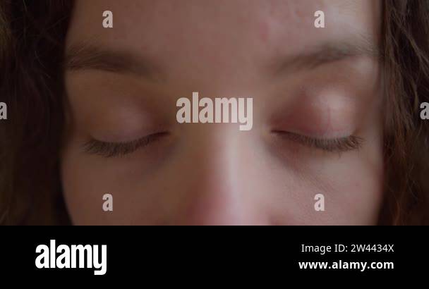 Woman open blue eyes. Close up of female face with wide blue eyes ...