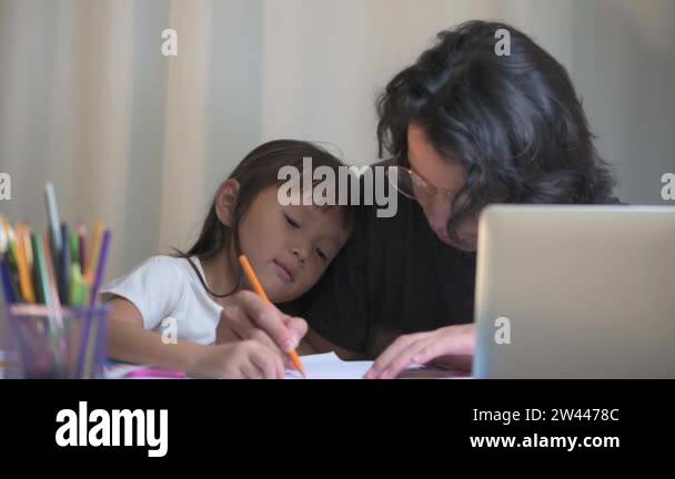 Home school concept,father teach daughter asian children doing school ...