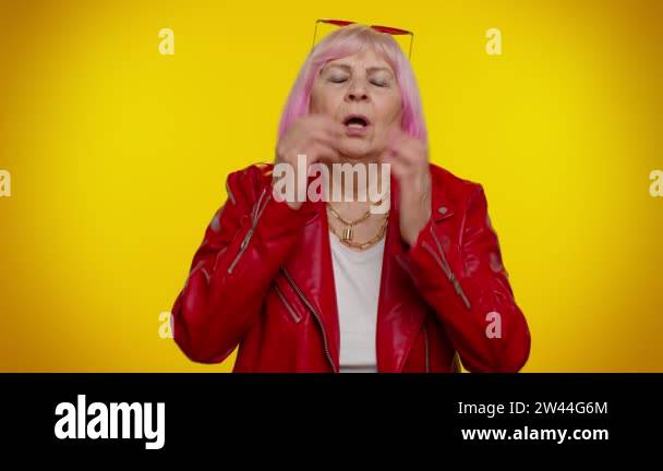 Unhealthy mature old granny grandmother coughing covering mouth with ...