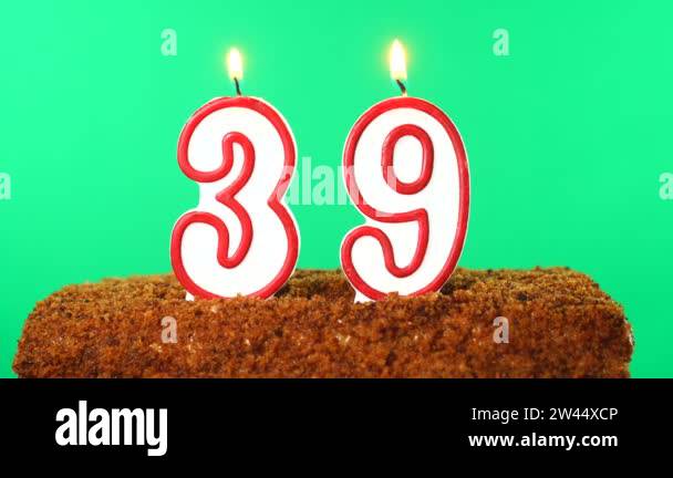Cake with the number 39 lighted candle. Chroma key. Green Screen ...