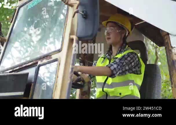 Woman driving heavy equipment Stock Videos & Footage - HD and 4K Video ...