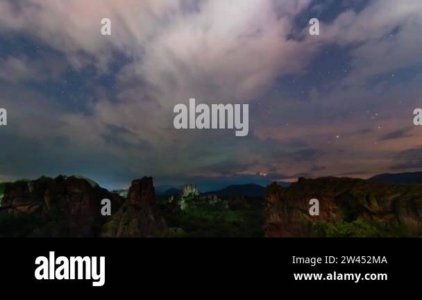 Amazing night time lapse with Milky Way galaxy, storm lightning, plane ...