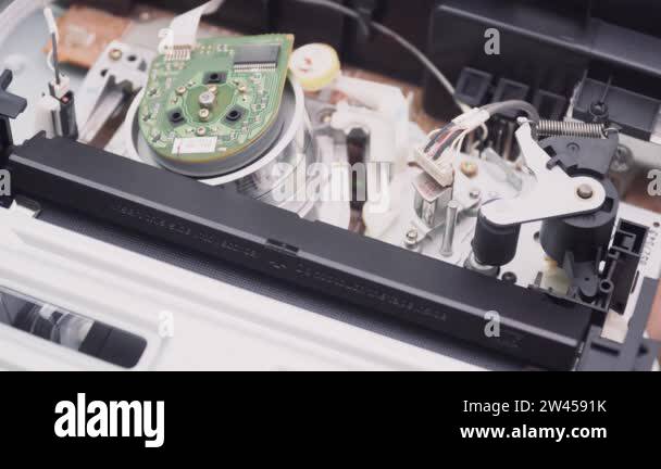 Close-up a VHS video cassette recorder tape loading. VHS mechanics ...