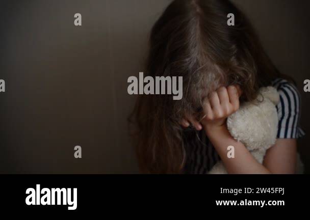 Little girl crying in the corner. Domestic violence concept Stock Video ...