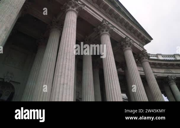 Colonnade with corinthian orders of ancient building. Action. Bottom ...