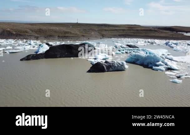 Iceland, Arctic. Glacier on the shore. Global warming. Icebergs float ...