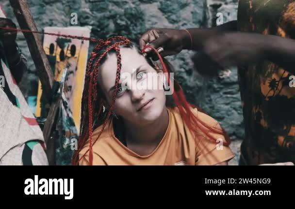 Process of Weaving African Braids with Red Kanekalon Outdoor, Zanzibar ...