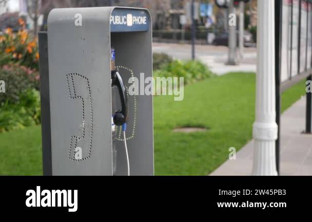 Retro coin-operated payphone station for emergency call on street ...