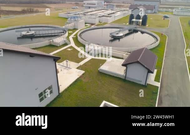 Sewage treatment plant. Water treatment tanks. Low flyover. A detailed ...