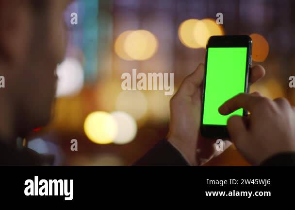 Guy hand scrolling phone green screen outdoor. Man touching screen mock up phone Stock Video ...