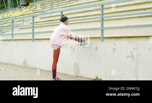Pretty alone Caucasian vintage girl in pink old fashioned jacket ...