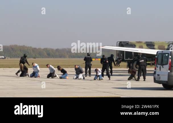 Kneeling terrorists captured by the Serbian special forces during a ...