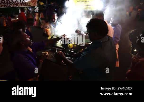 Coconut breaking service for devotees during Thaipusam Stock Video ...