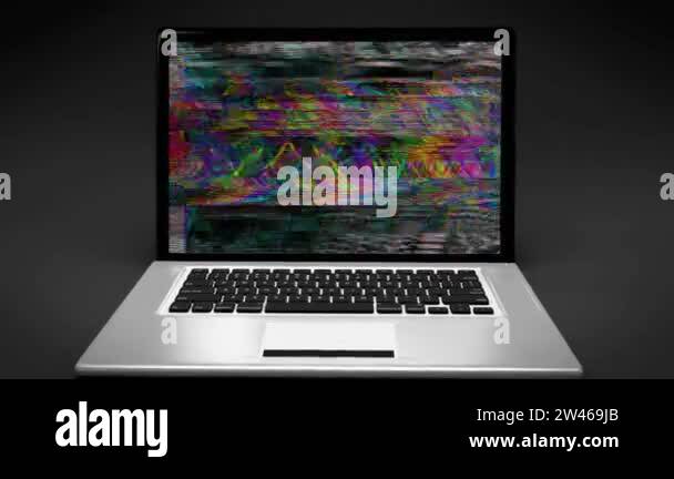 Zoom in a isolated laptop on black background with VHS problems ...