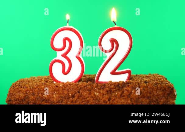 Cake with the number 32 lighted candle. Chroma key. Green Screen ...