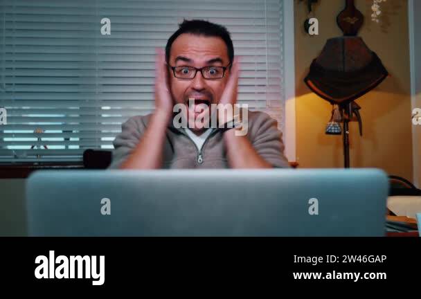 Man shocked computer Stock Videos & Footage - HD and 4K Video Clips - Alamy