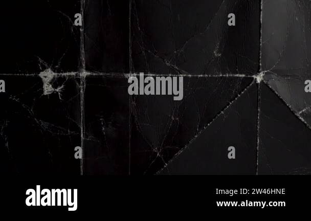 Crumpled black paper with wrinkles and rubbed corners. Old wrapping ...