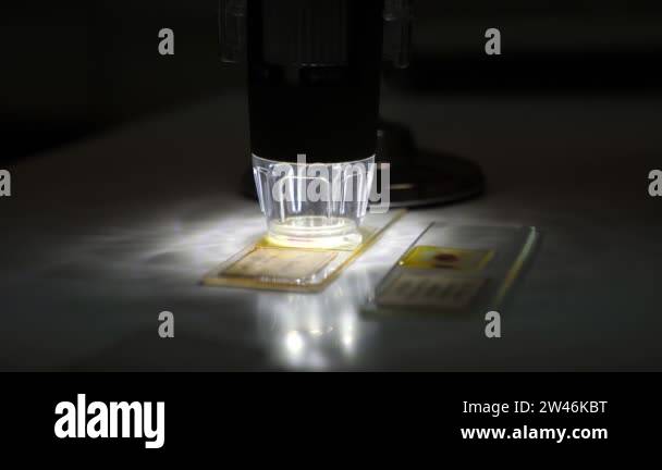 Electron microscope checking and analyzing grain quality analysis in a ...