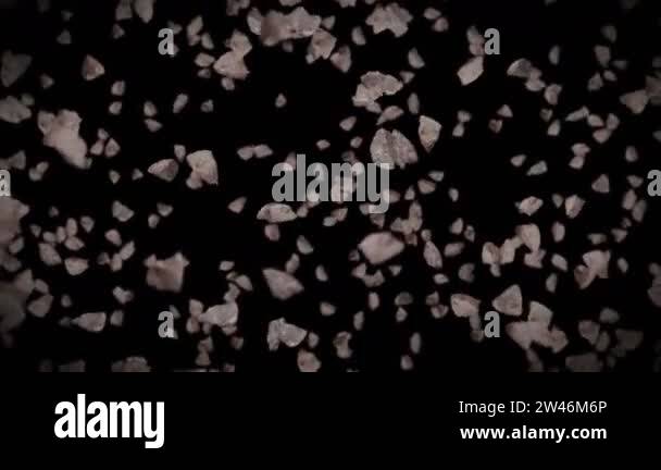 Flying many rock stone on black background. Broken splash explosion ...