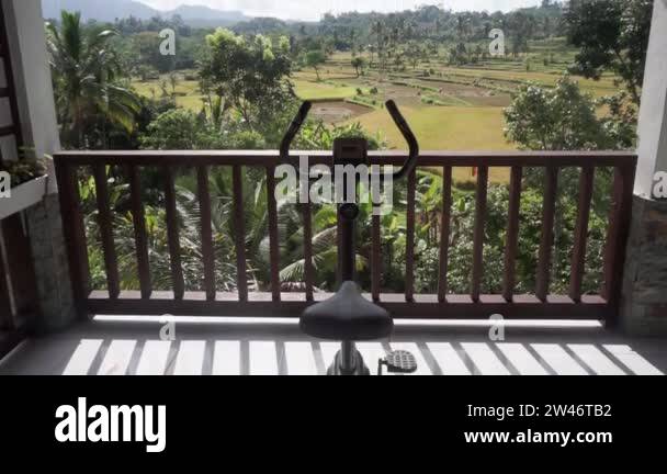 Video footage of exercise bike on the terrace with stunning views of ...